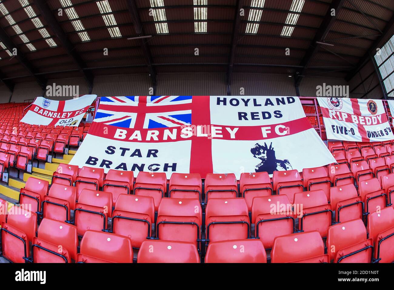 Barnsley flags strewn across the Ponty End stand at Oakwell Stock Photo ...