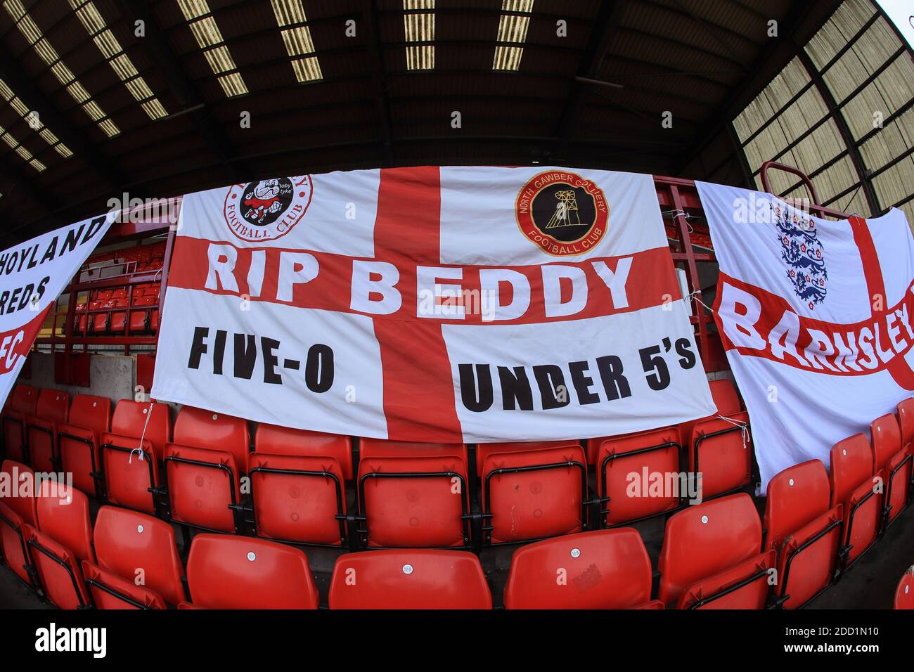 Barnsley flag with R.I.P Beddy is placed on railings in the Ponty End ...
