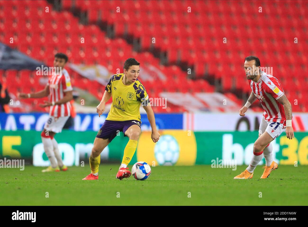 Carel Eiting #14 of Huddersfield Town controls the ball Stock Photo - Alamy