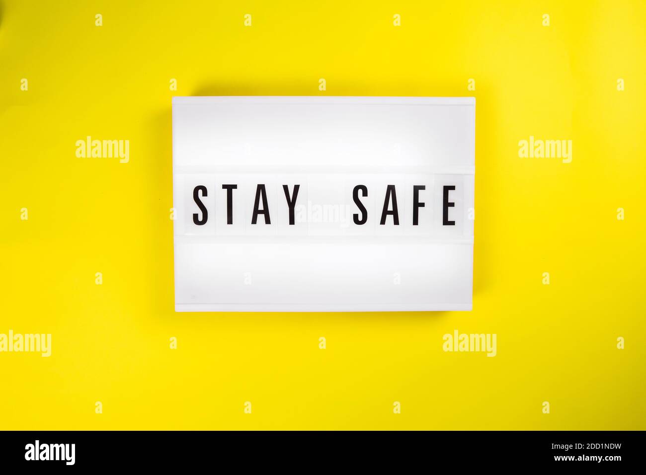 Stay Safe message on lightbox on yellow background isolated Stock Photo ...