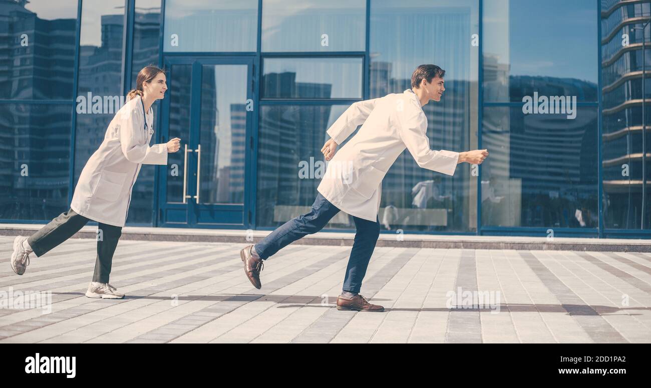 young doctors rush to an emergency call Stock Photo - Alamy