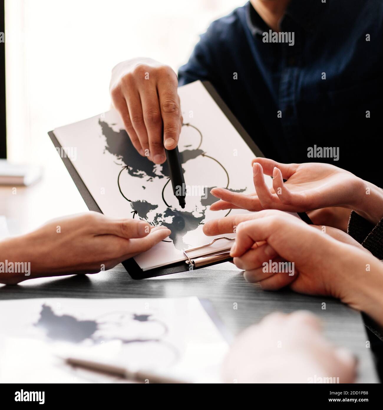 close up. group of employees discussing new logistics schemes. Elements ...