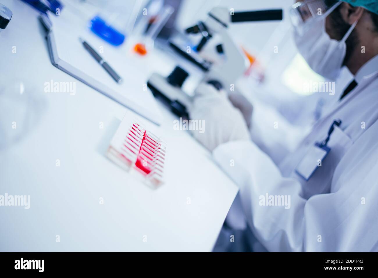 blurry image of a desktop in a medical laboratory Stock Photo - Alamy
