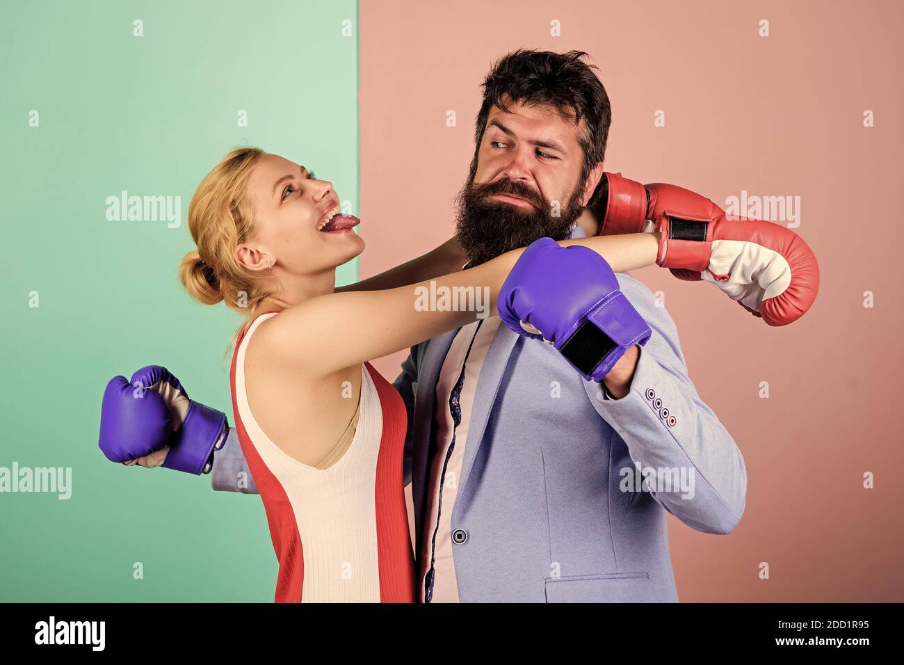 Family life. Boxers fighting gloves. Difficult relationships. Couple in ...