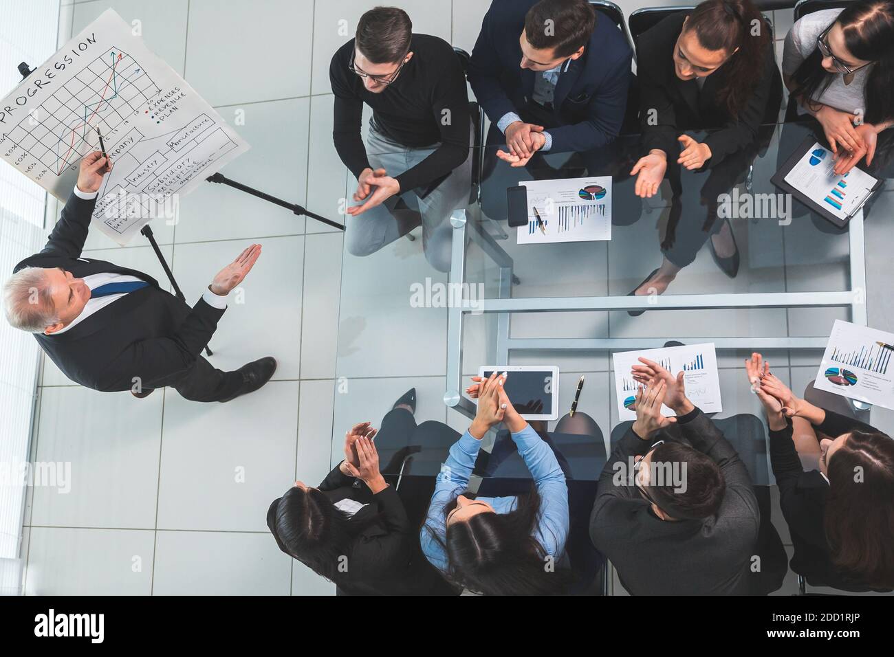 top view. boss at a meeting with the business team Stock Photo - Alamy