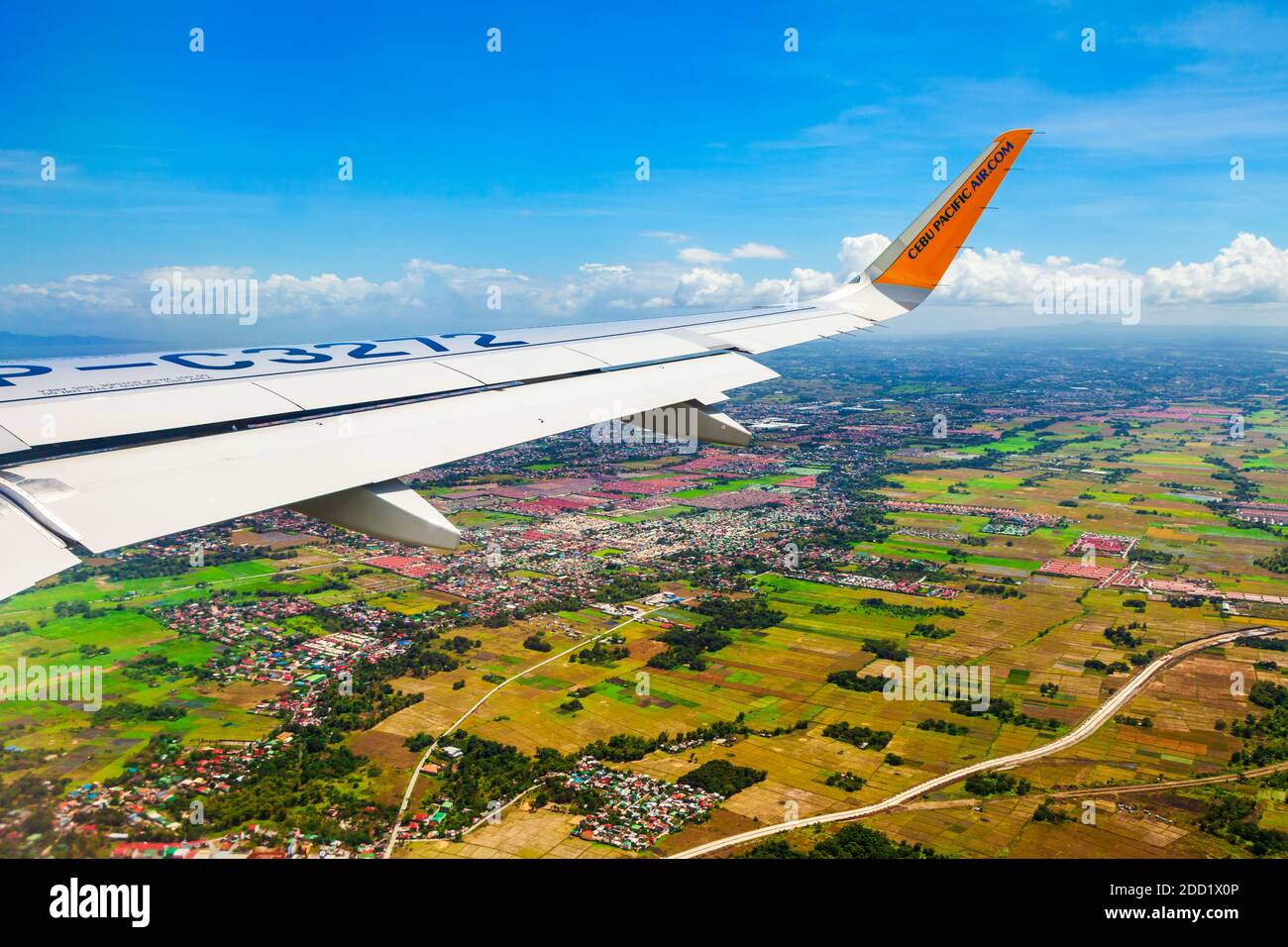 MANILA, PHILIPPINES - FEBRUARY 23, 2013: Cebu Pacific airplane wing ...