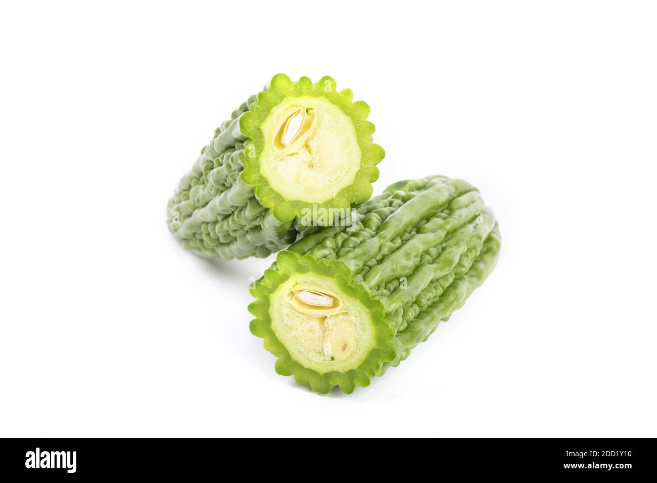 A sliced green gourd isolated on a white background Stock Photo - Alamy