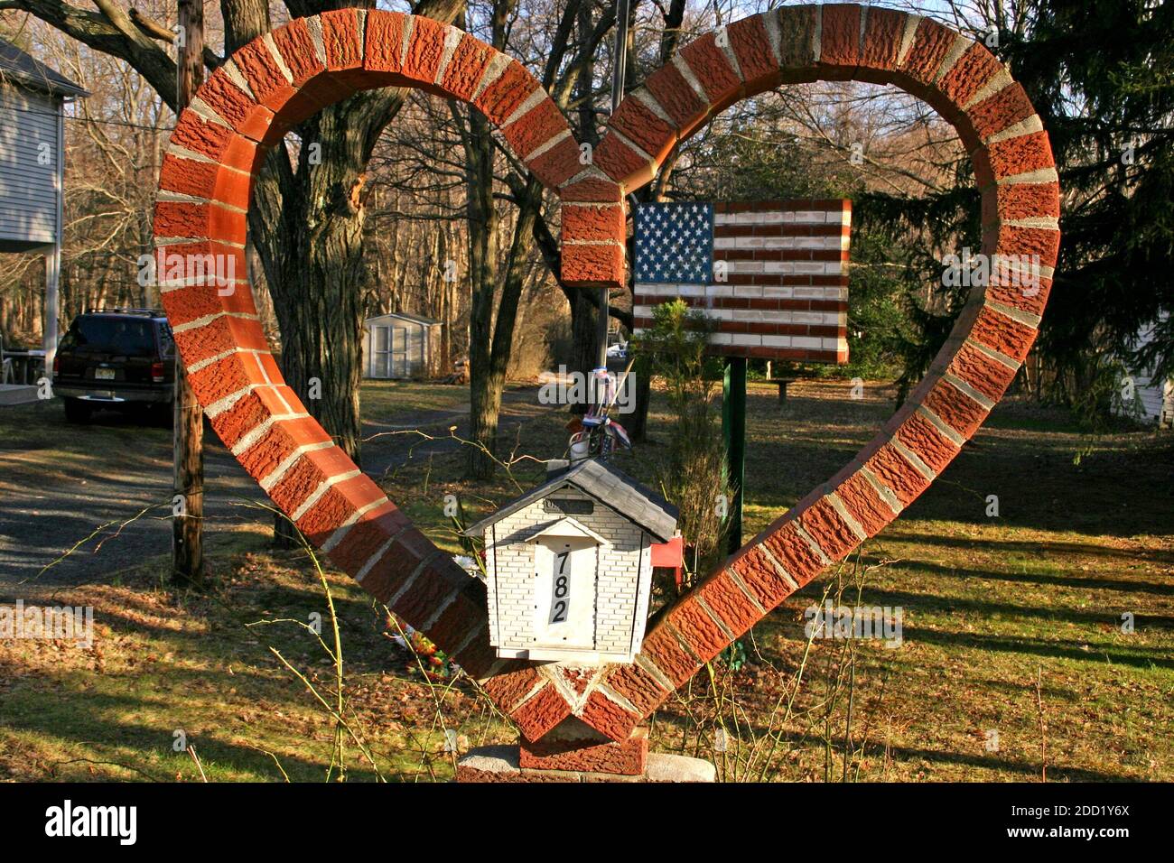 Pennsylvania, USA. Mailbox placed in a heart-shaped brick structure ...