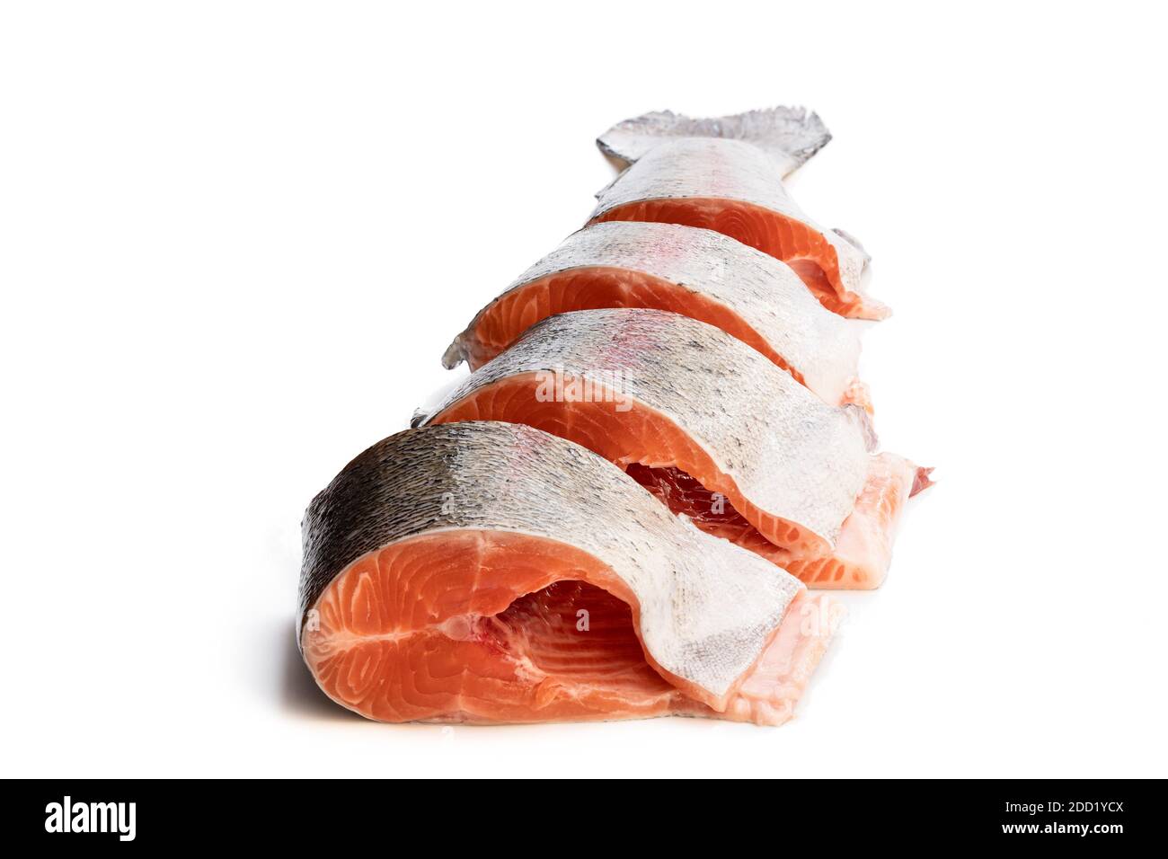 Fresh raw headless rainbow trout fish cut into pieces isolated on white ...