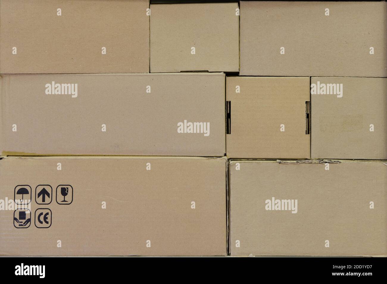 Cardboard boxes at the post office close-up, beige background Stock ...