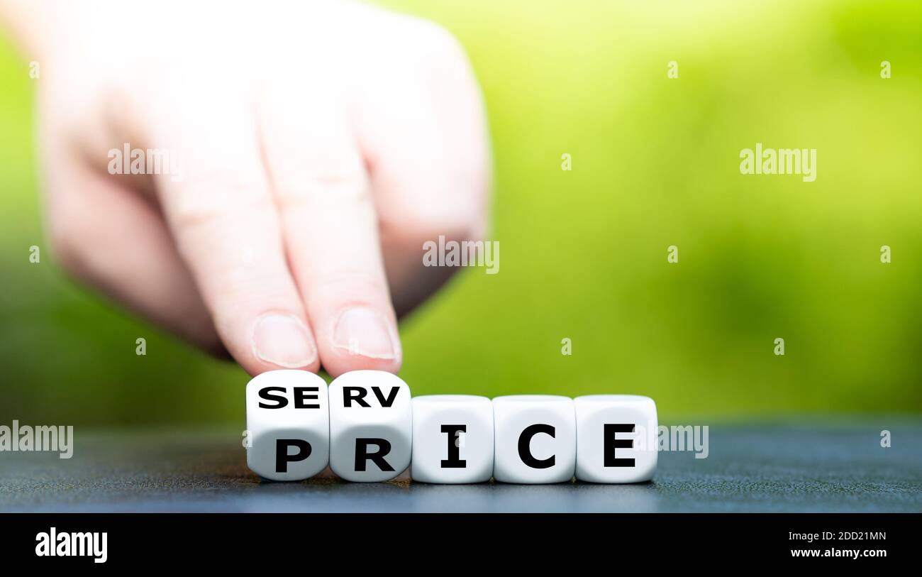 Dice form the words price and service Stock Photo - Alamy