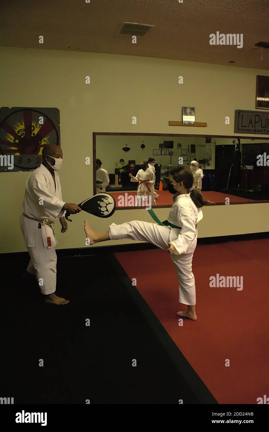 This action photo is of my daughter and her classmates in a Karate ...