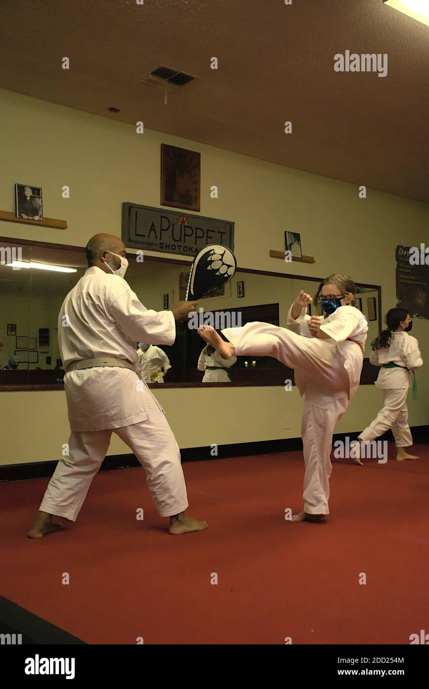 This action photo is of my daughter and her classmates in a Karate ...