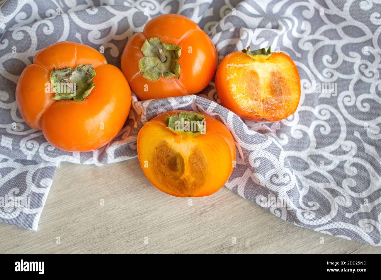 fresh ripe persimmon isolated on white background Stock Photo - Alamy