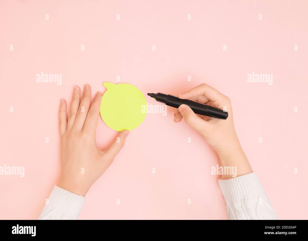 Sticker Top view photo with copy space Woman is writing on green ...