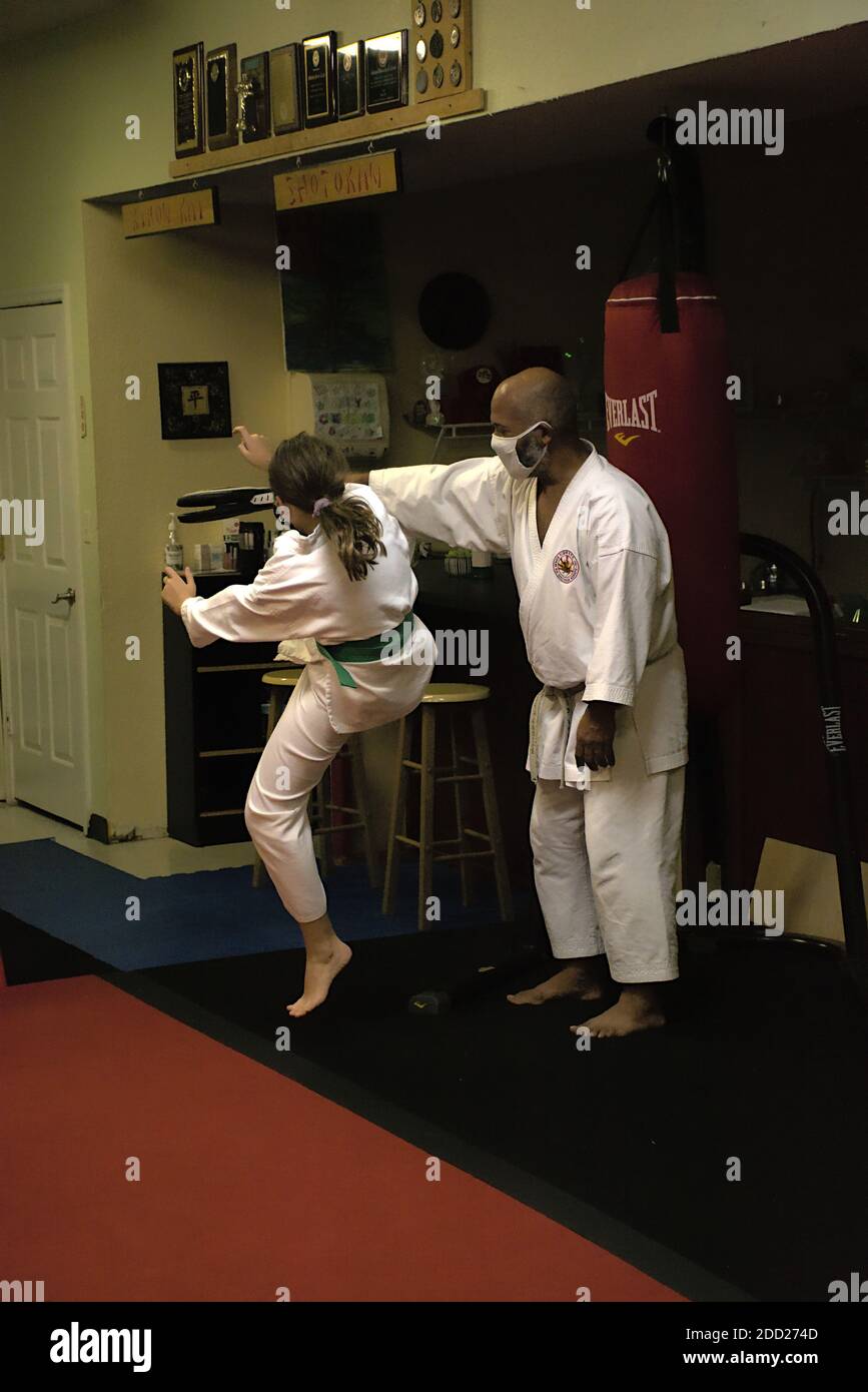 This action photo is of my daughter and her classmates in a Karate ...