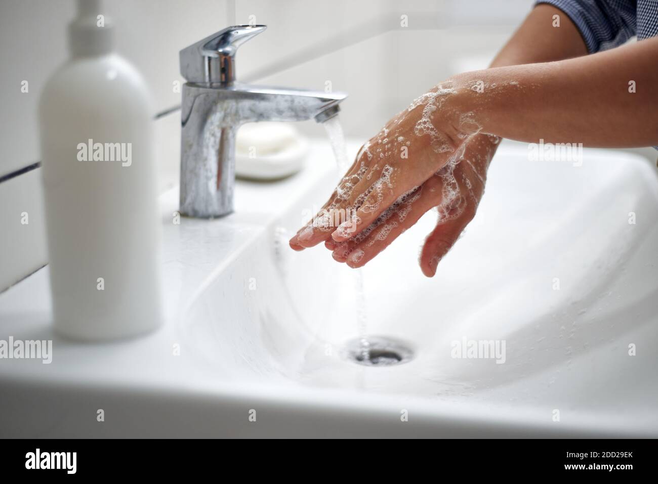 Hand washing rubbing the back of the hands. Prevention of viral and ...