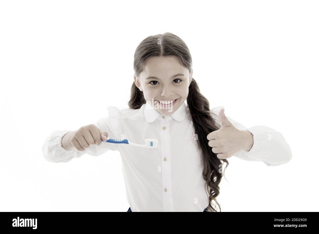 Girl brilliant perfect smile holds toothbrush with drop of paste white ...