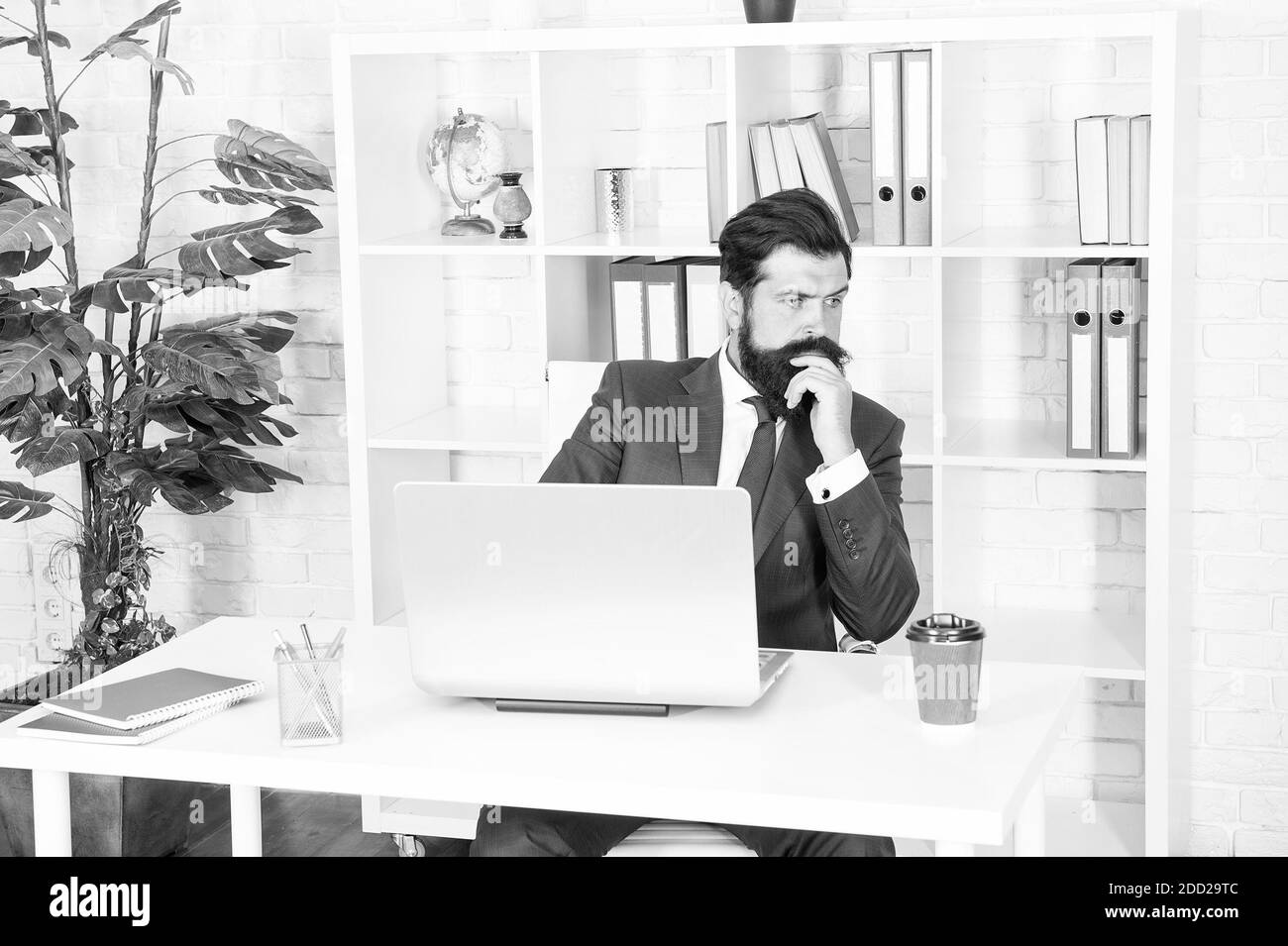 Notebook thinking business man Black and White Stock Photos & Images ...