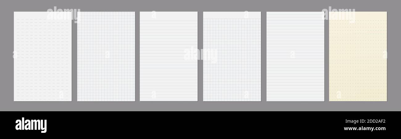 Torn of white and yellow lined, math note, notebook paper are on dark ...