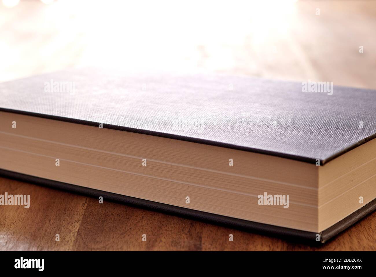 A studio photo of a hard cover book Stock Photo - Alamy