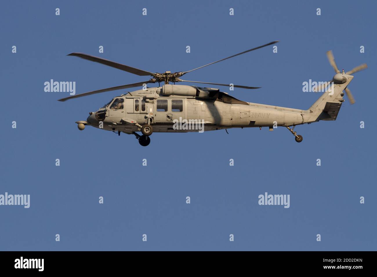 Us navy helicopter flying hi-res stock photography and images - Alamy