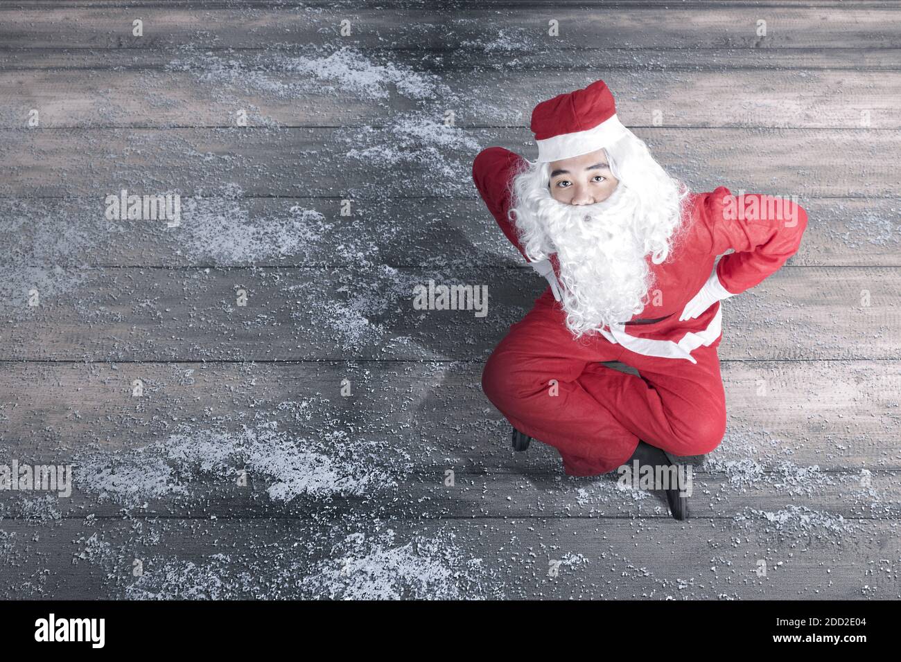 Santa claus sitting on wooden hi-res stock photography and images - Alamy