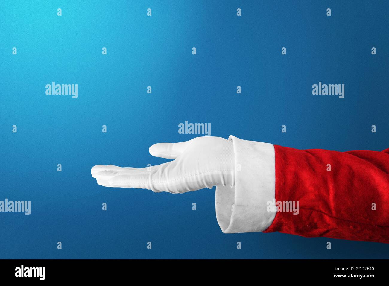 Santa Claus with an open hand gesture with a colored background. Empty ...