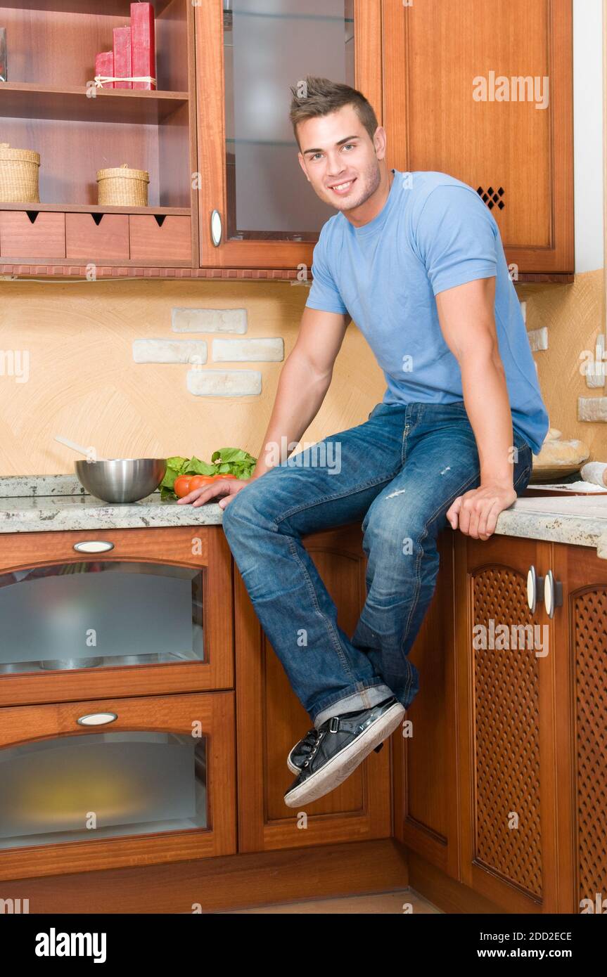man in the kitchen after cooking Stock Photo - Alamy