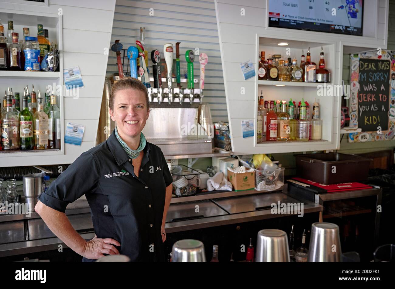 Female bartender and happy employee at the Great Southern Cafe in ...