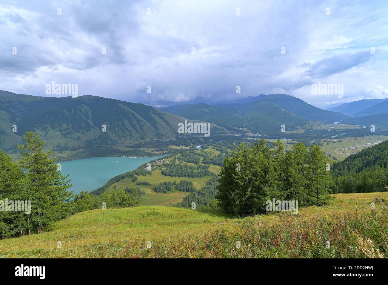 Aerial view of the Kanas Lake scenic area and the Altai Mountains ...