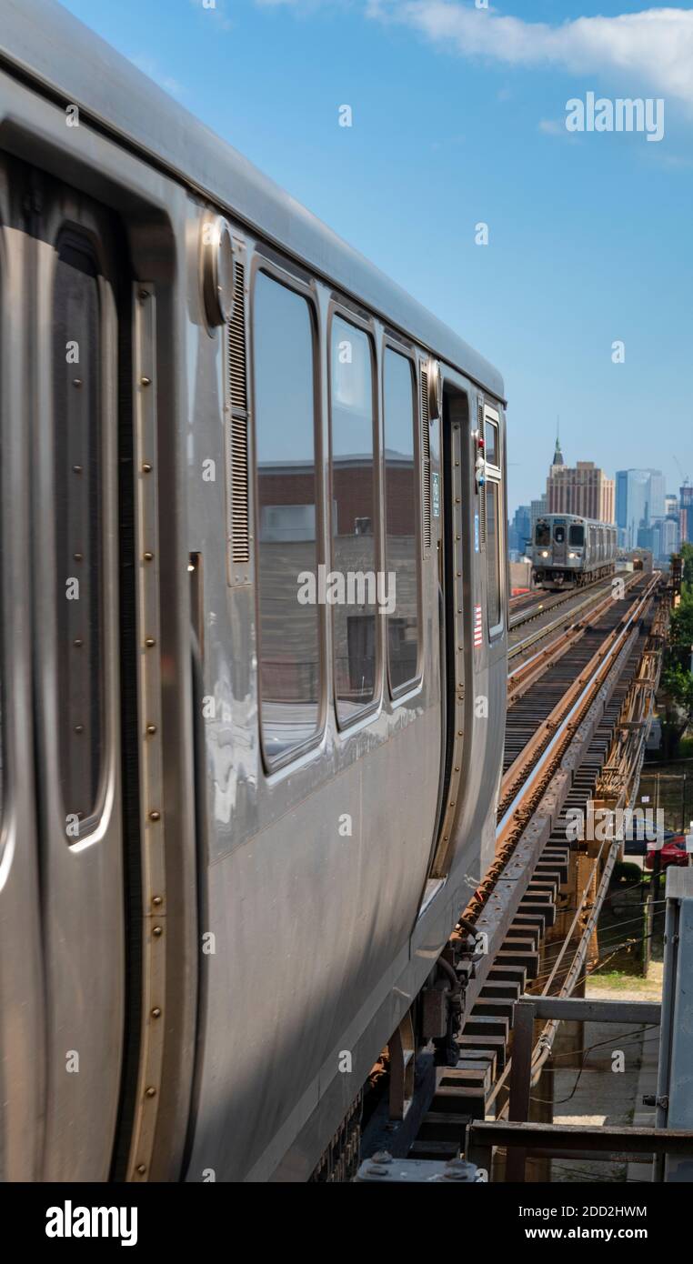 Train cars passing in city hi-res stock photography and images - Alamy