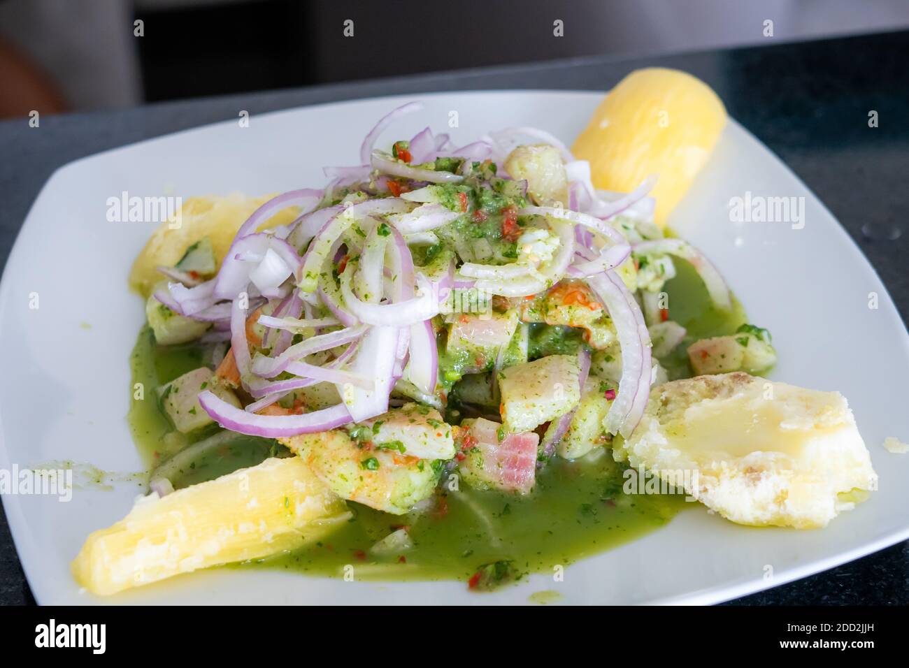 Peruvian ceviche with boiled yuca Stock Photo - Alamy