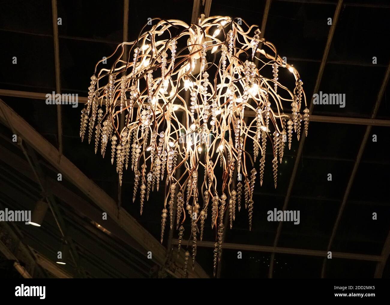 A large crystal chandelier made with wild tree branches Stock Photo - Alamy