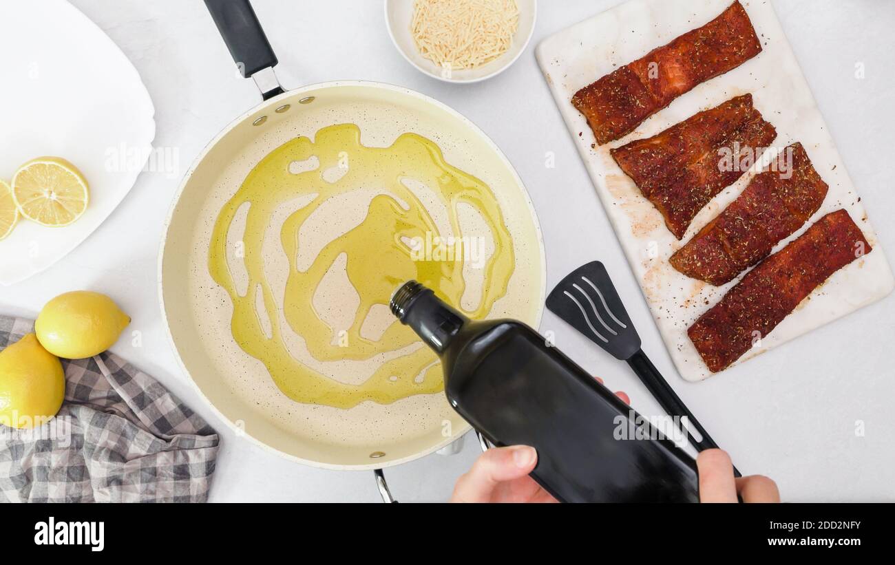 Pouring oil pan hi-res stock photography and images - Alamy