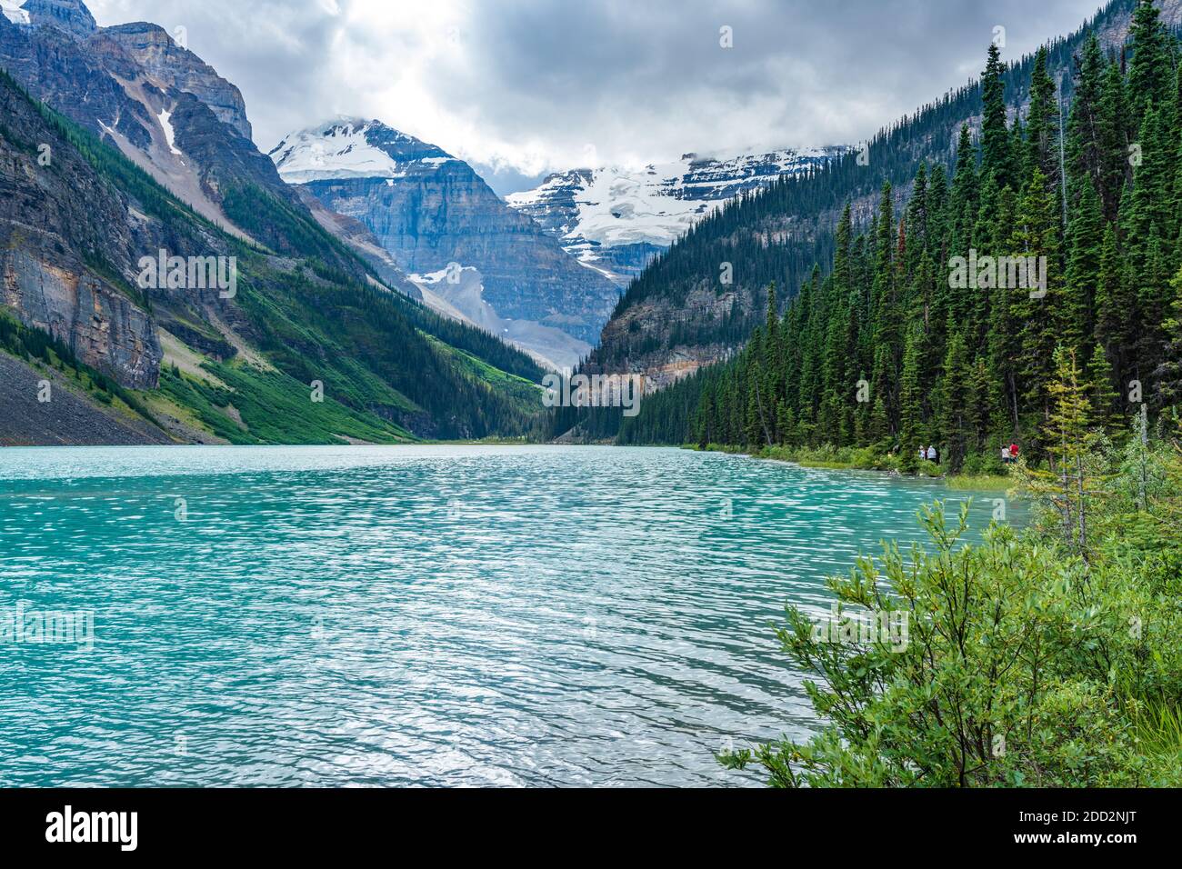 Lake Louise in summer sunny day morning. Blue sky and white clouds ...
