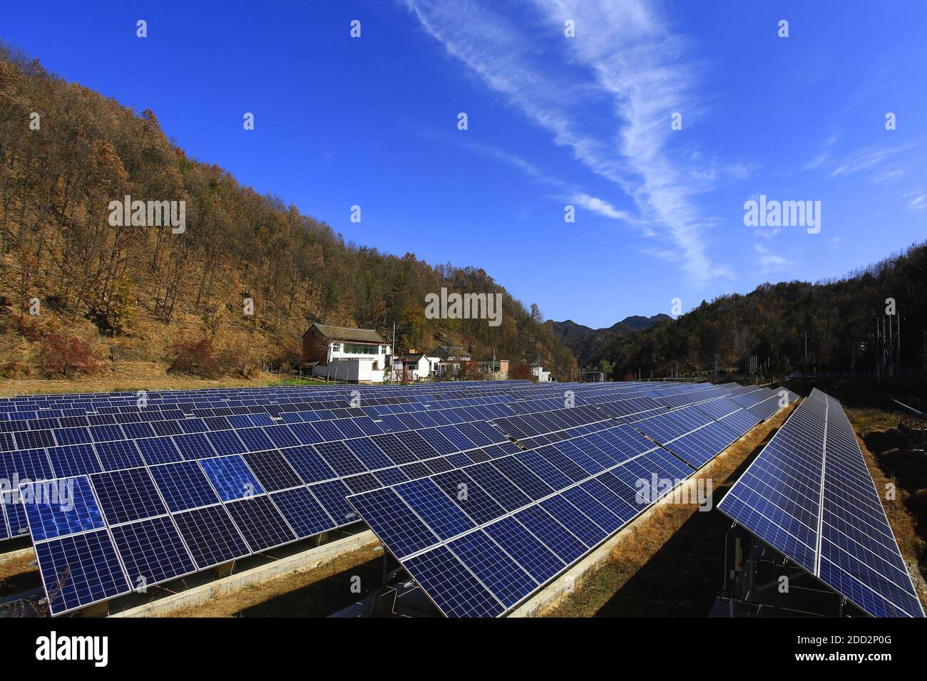 The western mountainous rural photovoltaic power station Stock Photo ...