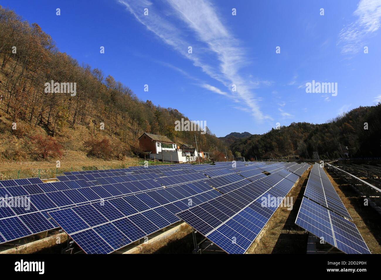 The western mountainous rural photovoltaic power station Stock Photo ...