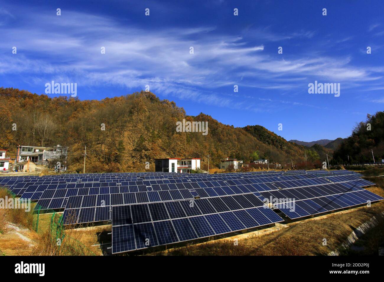 The western mountainous rural photovoltaic power station Stock Photo ...