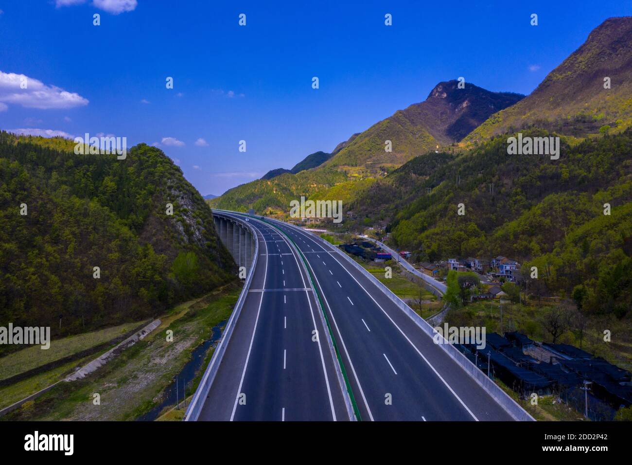 Through the call north expressway in the western mountains Stock Photo ...