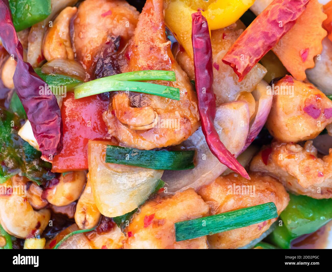 Thai food, a portion of chicken with cashew nuts. Shallow depth of ...