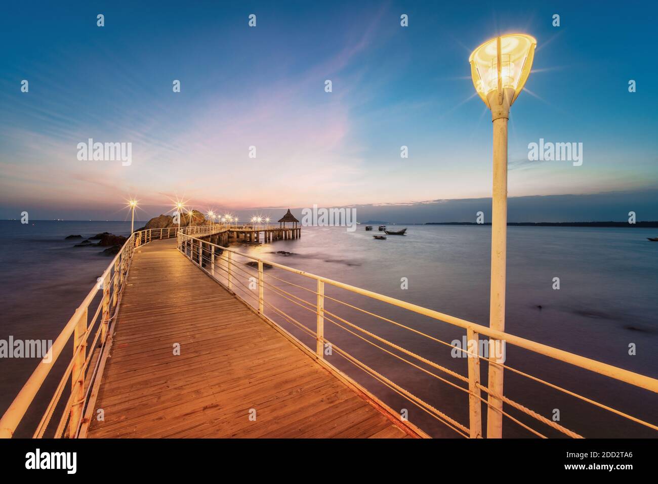 Night at the beach pier Stock Photo - Alamy