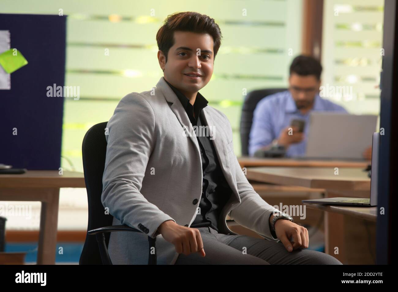 Man smiling behind notice hi-res stock photography and images - Alamy
