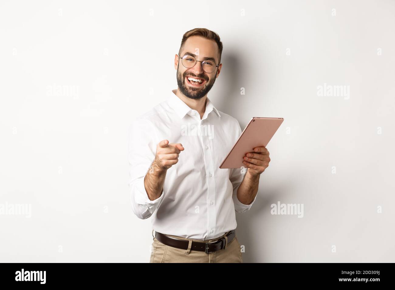 Happy and satisfied boss praising good job, reading on digital tablet ...