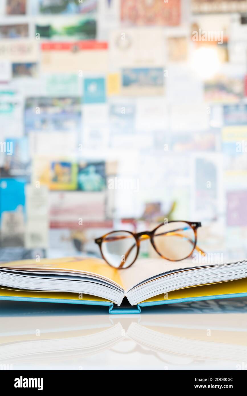 Book lying on the table hi-res stock photography and images - Alamy