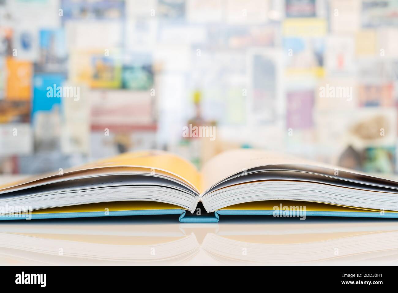 An open book with soft pastel blurred background Stock Photo - Alamy