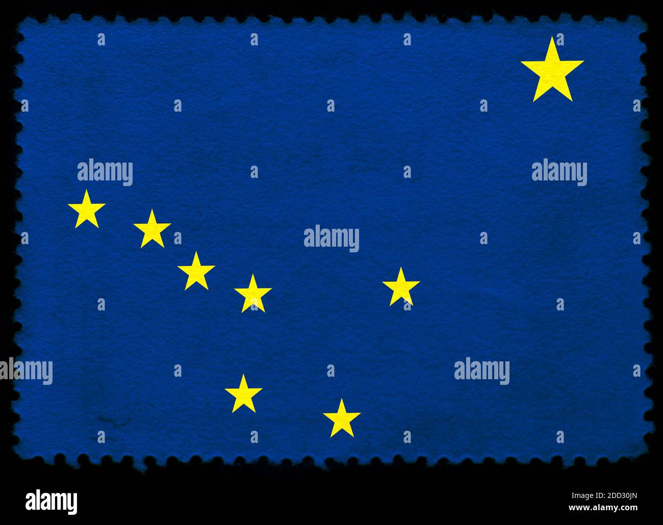 United States Alaska state flag on the old grunge postage stamp ...