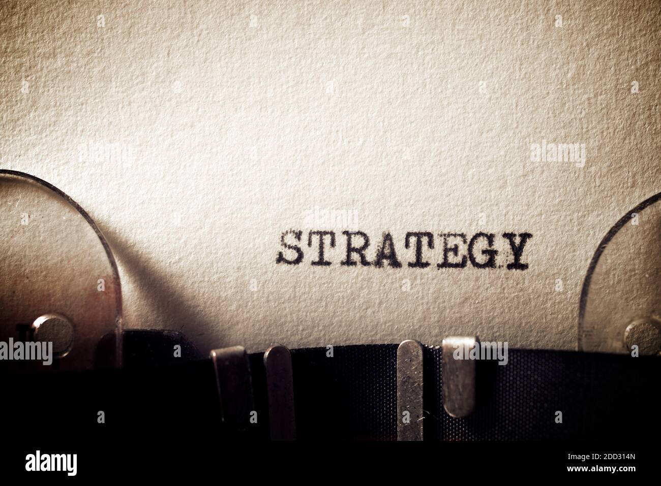 Strategy word written with a typewriter Stock Photo - Alamy