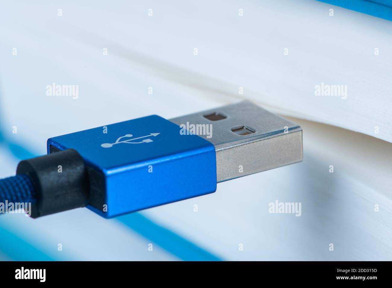 Macro of USB cable connected to book Stock Photo - Alamy