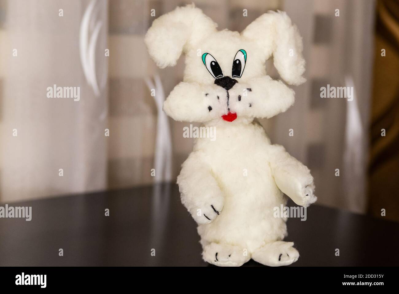 Cute white puppy soft toy for childrens playing Stock Photo - Alamy